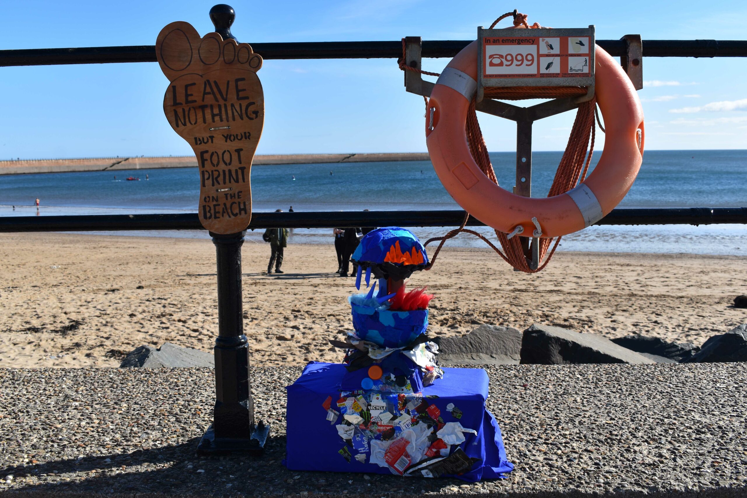 Art students make waves with climate change beach installations ...